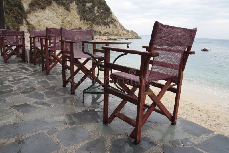 Beach cafe in rain stock photo. Image of sidewalk, clouds - 6593288