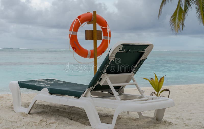 Beach Chair with Beach and Sea Views Stock Photo - Image of maldives ...