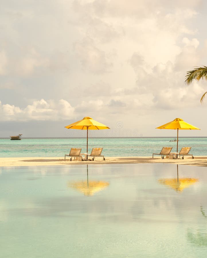 Beach Chair with Infinity Beach Views in Maldives, Stock Photo - Image ...