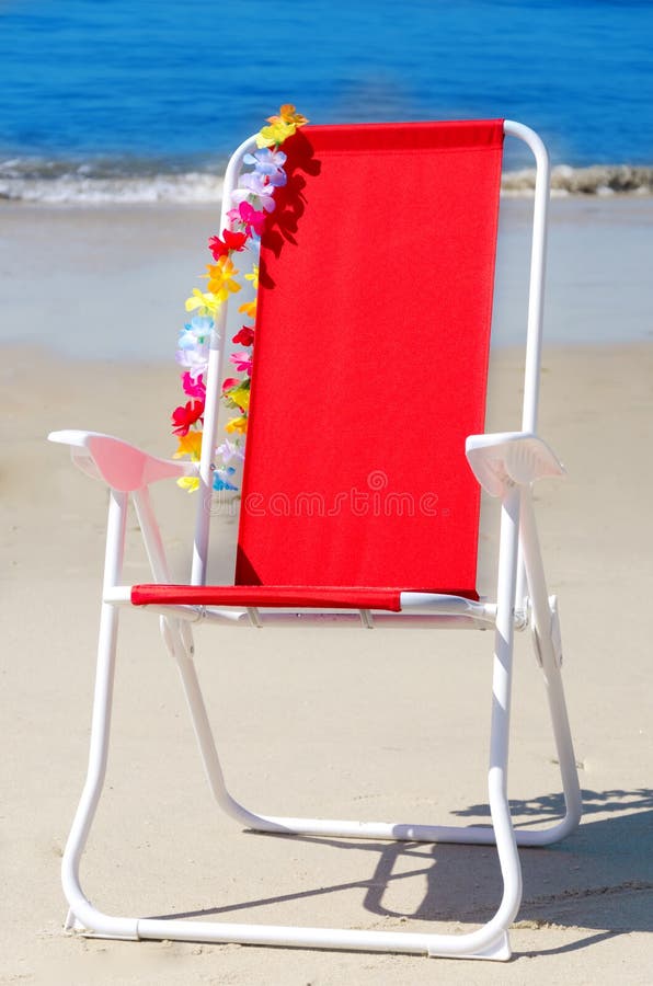 Beach chair by the ocean stock photo. Image of vacation - 40907180