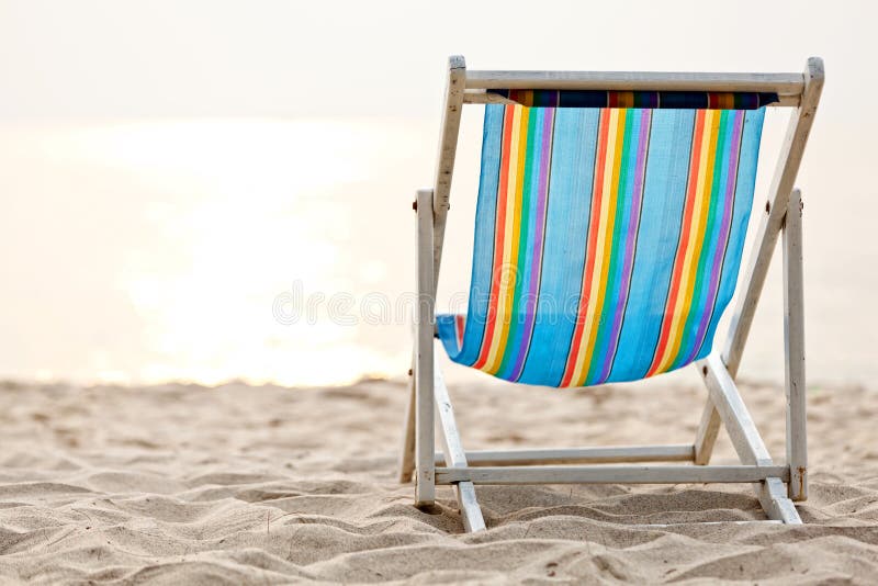 Beach chair on sand stock image. Image of island, tranquil - 225652879