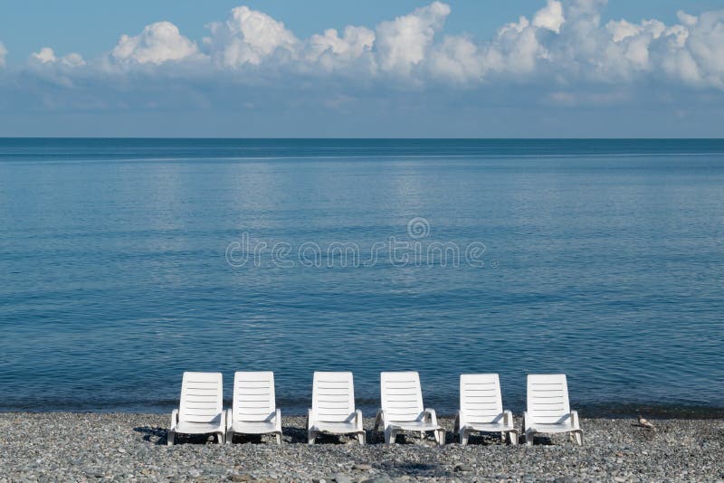 Beach Chairs by the Sea. Rest on the Sea. Stock Photo - Image of coast ...