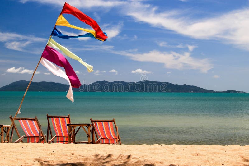 Beach Chairs with Colorful Flags at Ocean Front, Koh Samui, Thailand ...