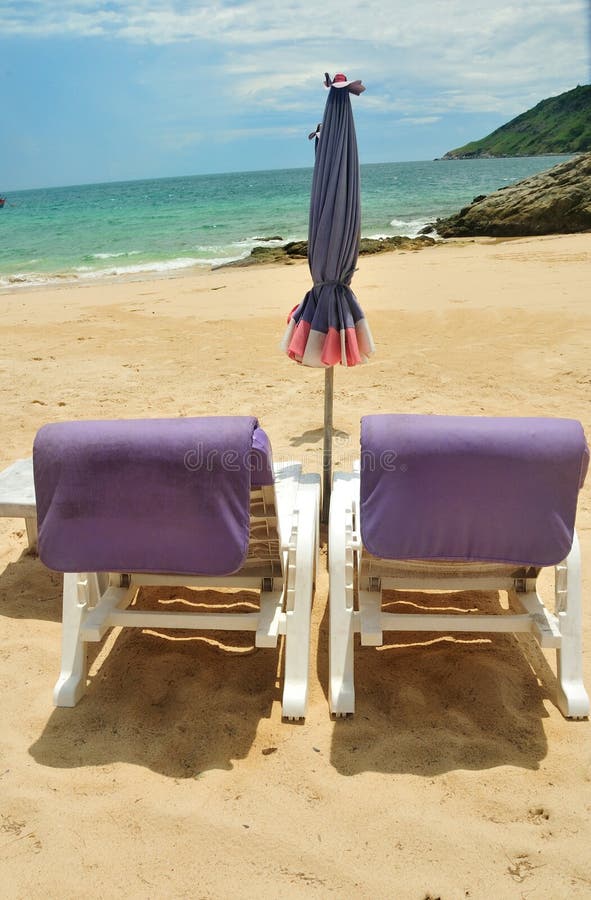 Beach Chairs on Sand in Front of Beach Stock Photo - Image of holiday ...
