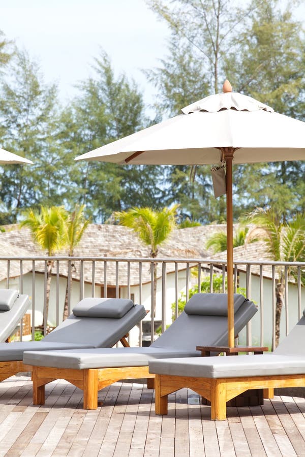 Beach Chairs and Umbrella Side Swimming Pool Stock Image - Image of ...