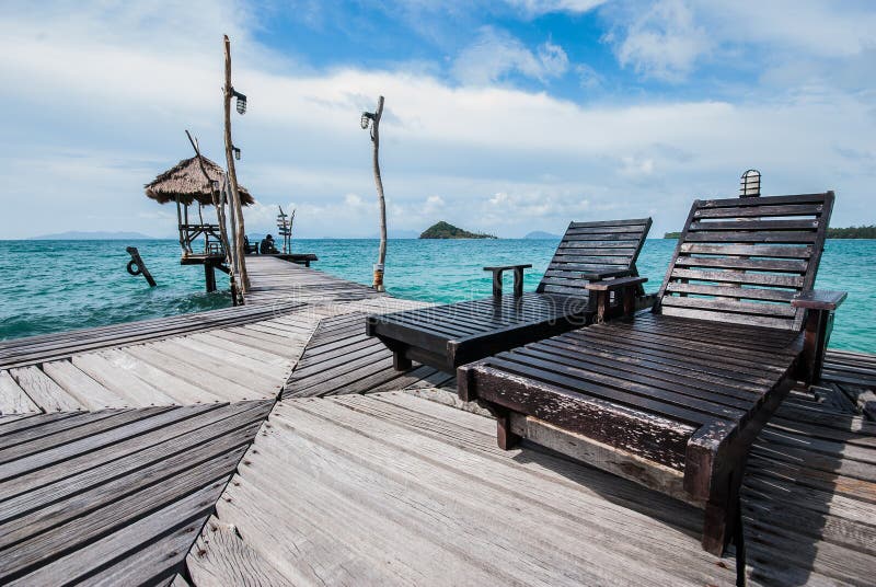 Beach Chairs on a Wooden Bridge Stock Image - Image of sunlounger, rest ...