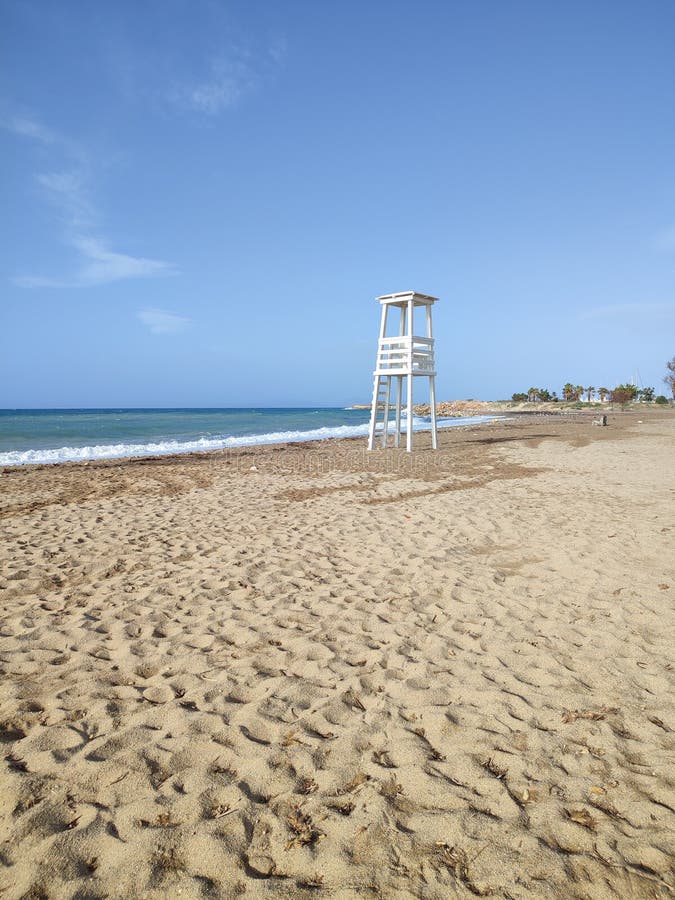 Coast Lifeguard Station and Raft on a Beach Stock Photo - Image of ...