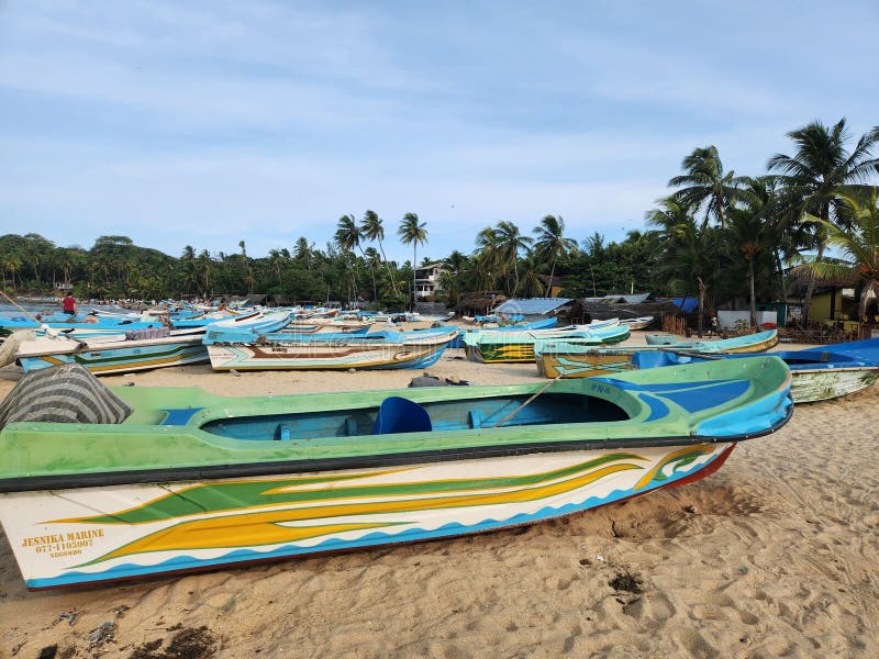 Beach with Colorful Small Boats on the Sand Editorial Stock Image ...