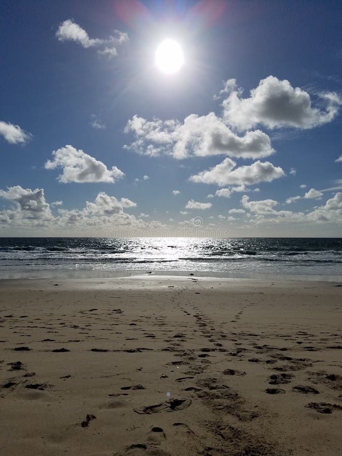 Beach day stock photo. Image of clouds, southern, sand - 116231386