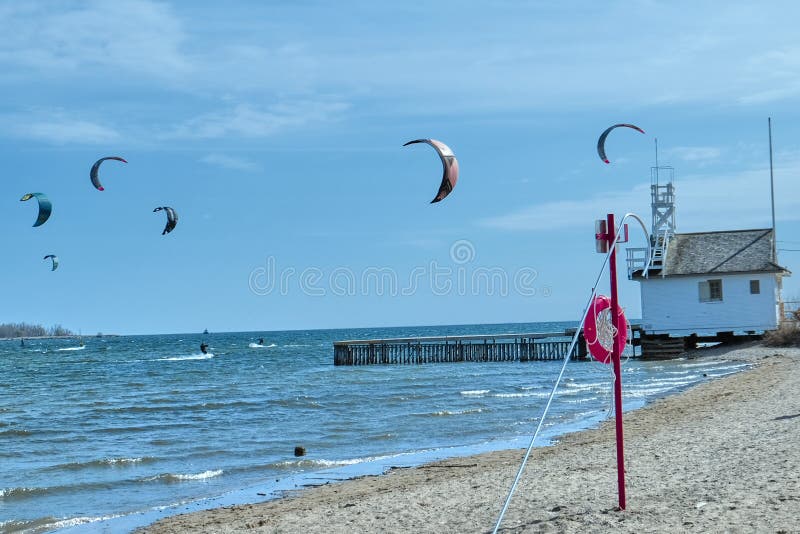 Beach, deck and kites stock image. Image of tower, monochrome - 259195439