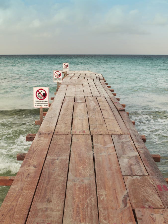 Beach Dock with Signals. No Swimming Stock Image - Image of scenic ...