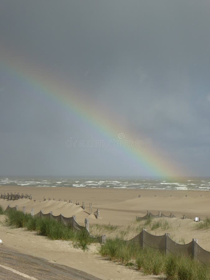 Rainbow at Dunkirk beach stock image. Image of world - 102177353