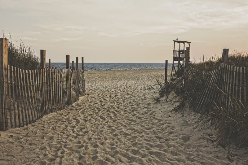 Beach at Dusk, Matte stock photo. Image of fence, coast - 60829316