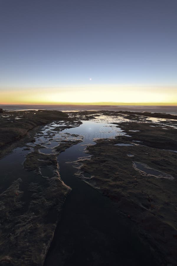 Beach at Dusk stock photo. Image of pool, mountains, nice - 63694008