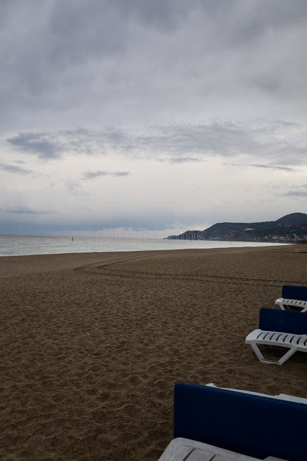 Beach empty loungers stock image. Image of coast, atmosphere - 361012297