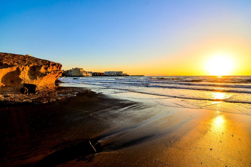 The Beach is Empty and the Sun is Setting Stock Image - Image of ...