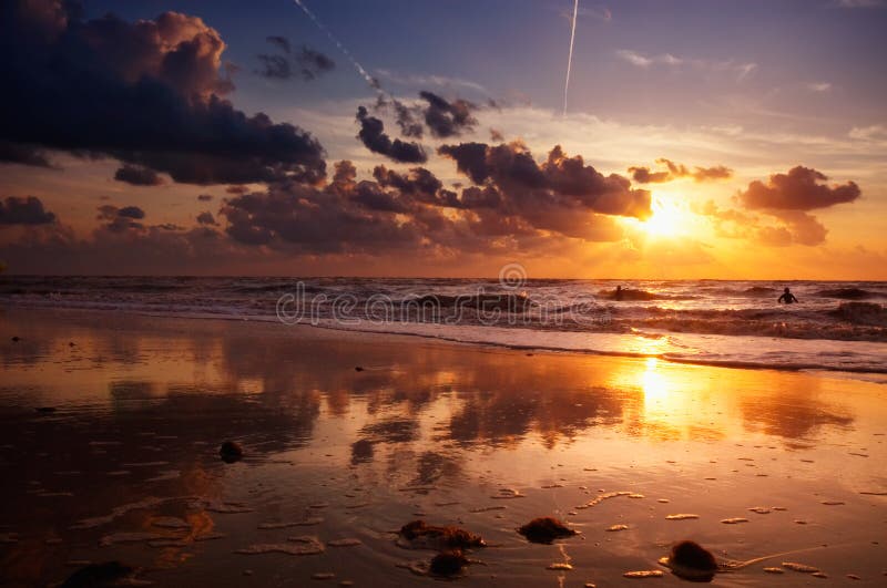 Beach in the evening stock photo. Image of golden, clouds - 1267034