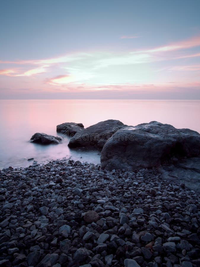 The beach in the evening stock photo. Image of sunset - 17870680