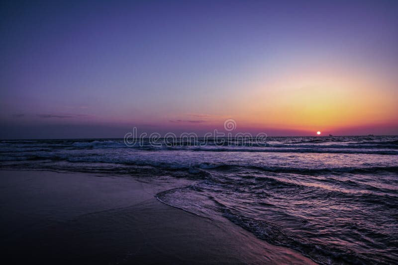 On the Beach Facing an Amazing Sunset Stock Image - Image of sunset ...