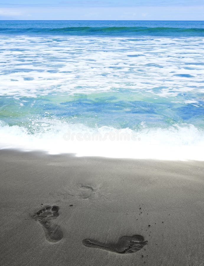 Beach Footsteps stock photo. Image of surf, vacation, holidays - 1090568