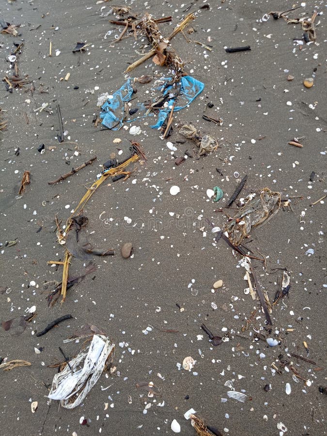 The Beach is Full of Scattered Rubbish. Marine Trash Stock Photo ...