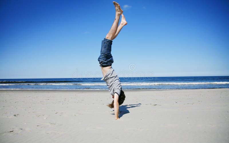 Beach Fun stock image. Image of vitality, cartwheel, lifestyle - 1222121