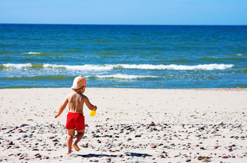 Beach fun stock photo. Image of child, blue, cheek, sand - 2180468