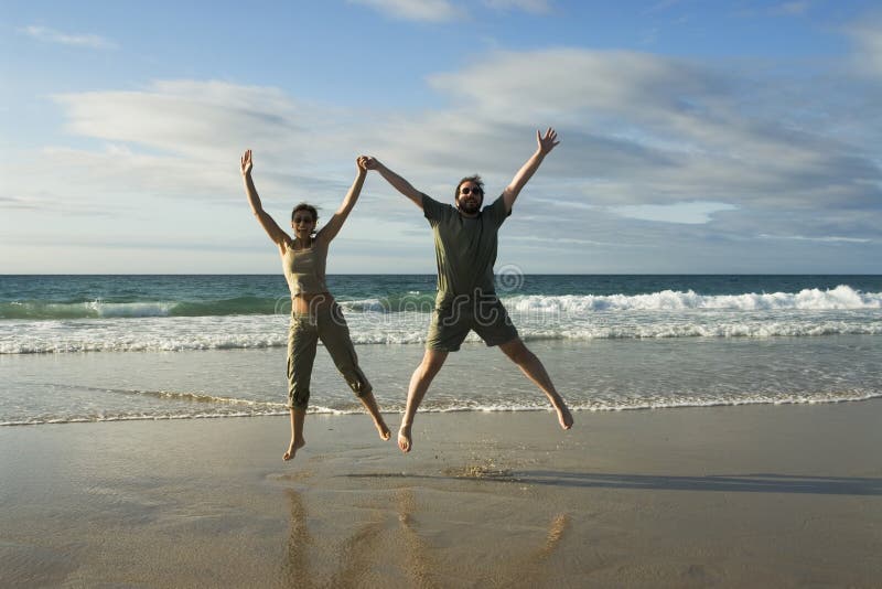 Beach fun stock image. Image of leap, blue, success, excitement - 2950059