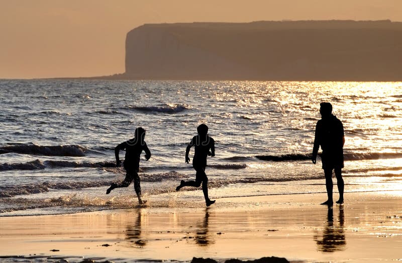 Beach fun editorial image. Image of cliffs, boys, games - 98218905
