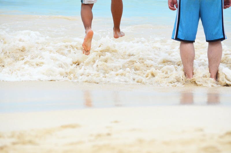 Jump in the ocean stock photo. Image of ocean, sand, travel - 36096394