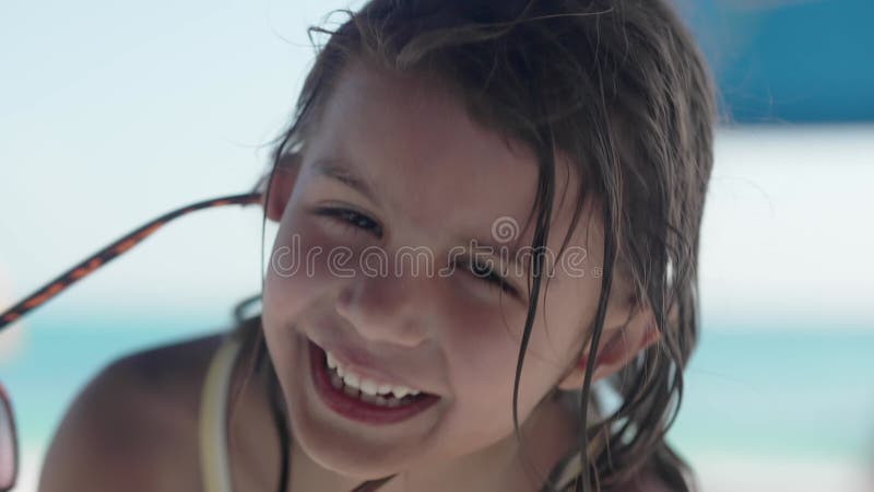 Beach Fun: Joyful 5-Year-Old Girl Smiling on the Seashore Stock Footage ...