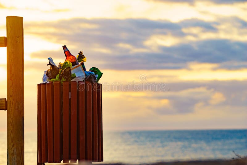 Beach with Garbage Bin Full of Trash Stock Image - Image of beach ...