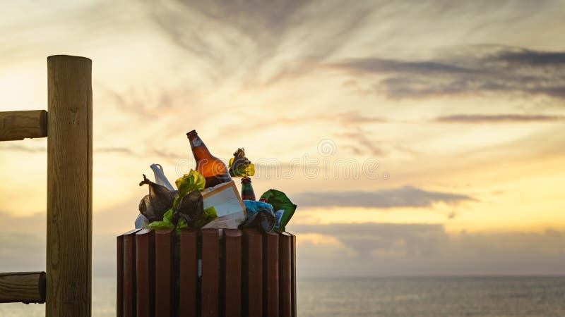 Beach with Garbage Bin Full of Trash Stock Image - Image of bottle ...