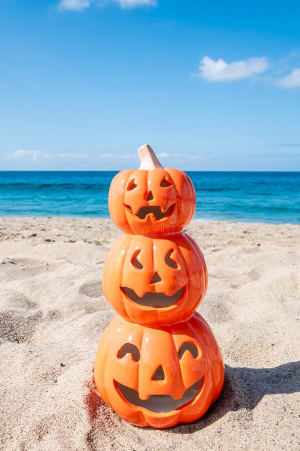 Beach Halloween Background with Pumpkin in the Witch`s Hats Stock Image ...