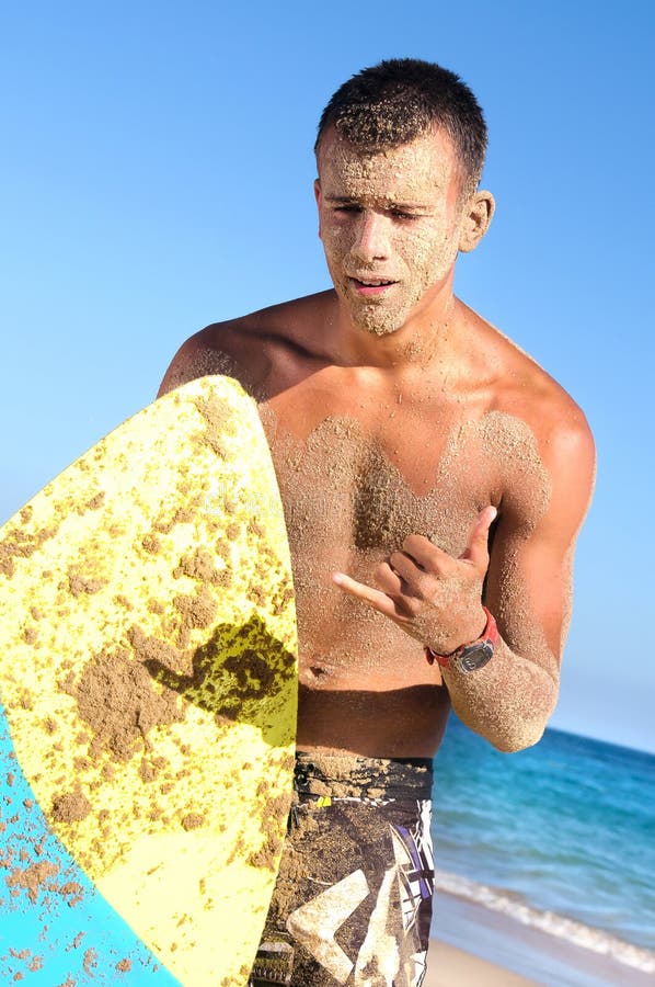 Handsome Surfer Posing with His Surfboard Stock Image - Image of ...