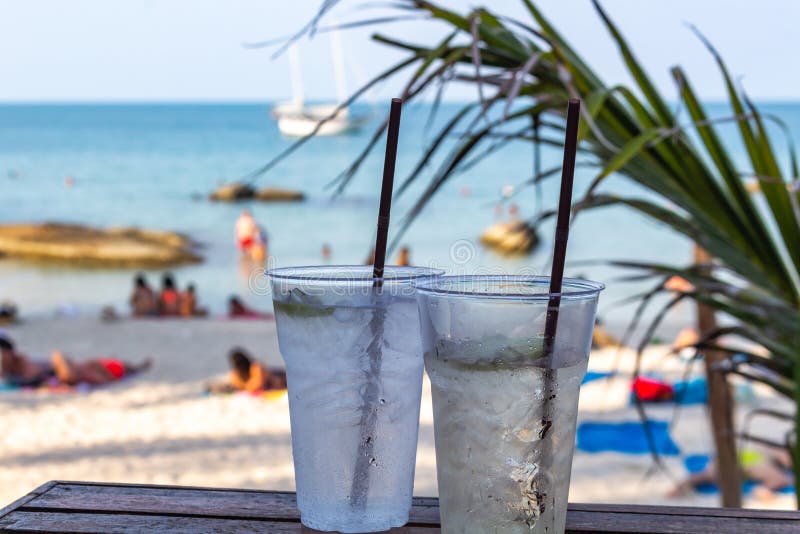 Beach happy hour drinks stock photo. Image of cocktail - 153745458