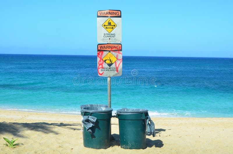 Beach Hazard Signs and Dustbins Stock Photo - Image of signpost ...