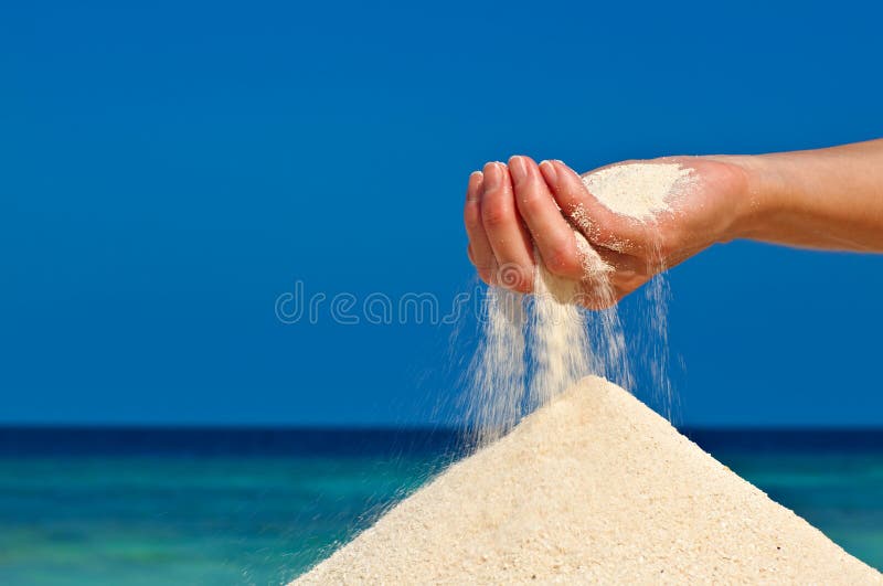 Sand Spilling Out of the Hand. Concept of the Transience of Time ...