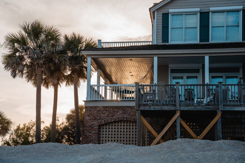 Beach House during a Sunset Stock Photo - Image of waterfall, morning ...