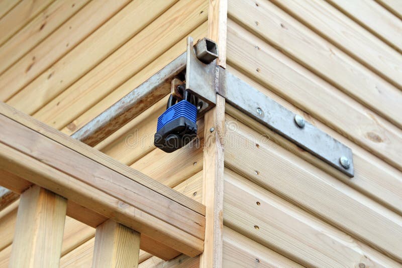 Beach hut security lock stock photo. Image of coastal - 32427598