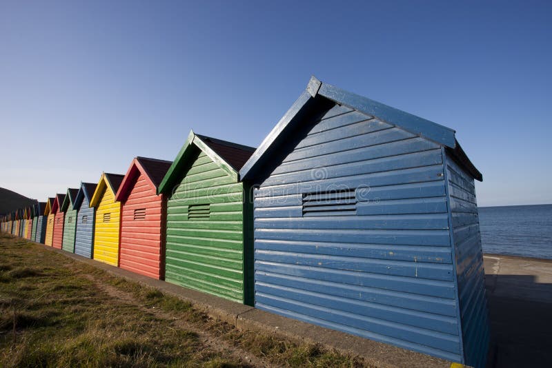 Storage Sheds on the Beach stock image. Image of blue - 1875777