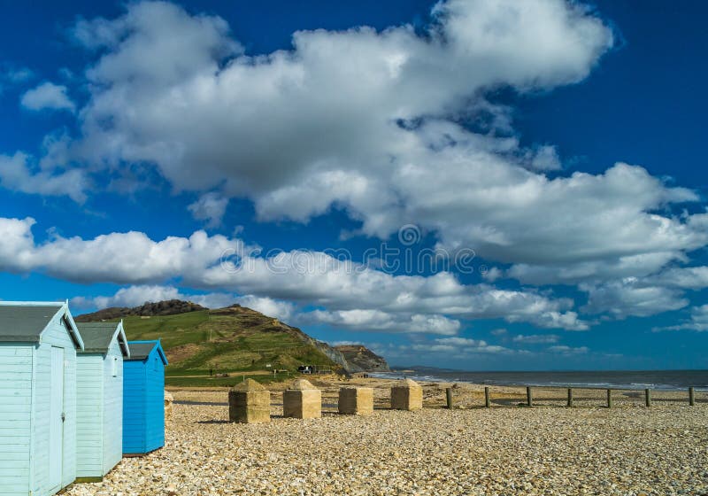 Beach Huts and Cloud Formation at Charmouth, Dorset Stock Photo - Image ...