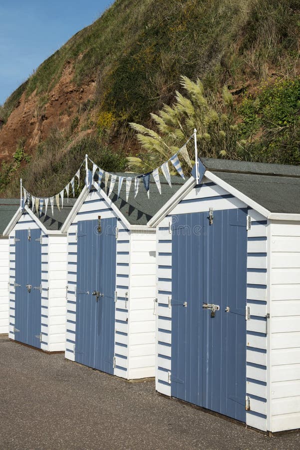 Blue and White Beach Huts at Seaton, Devon, UK. Stock Image - Image of ...