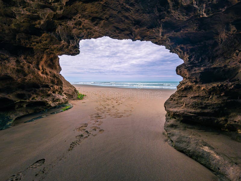 Beach from the Inside of a Large Rock Cave Stock Image - Image of rock ...