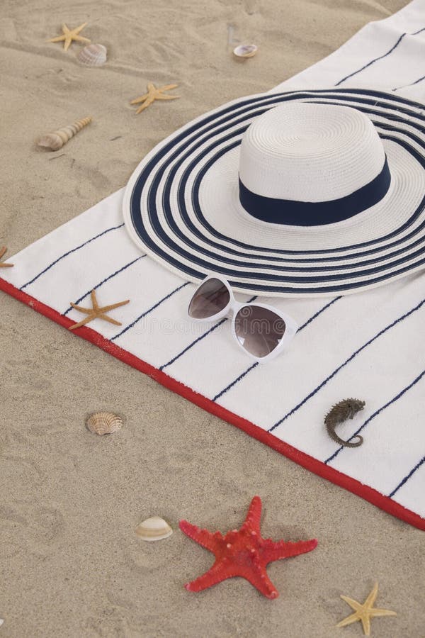 Beach Items on Sand for Fun Summer Stock Photo - Image of towel ...