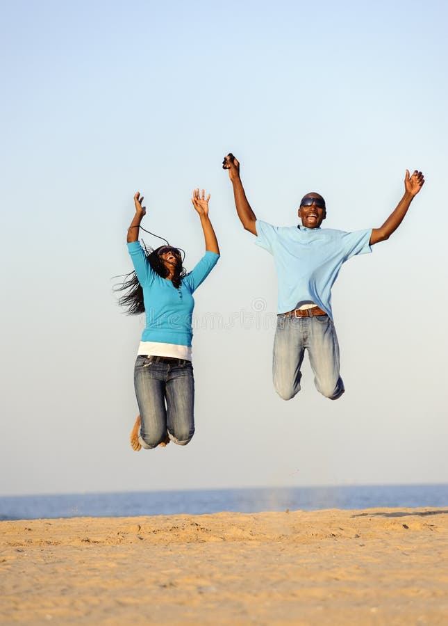 Beach Jump stock photo. Image of beautiful, boyfriend - 14907998