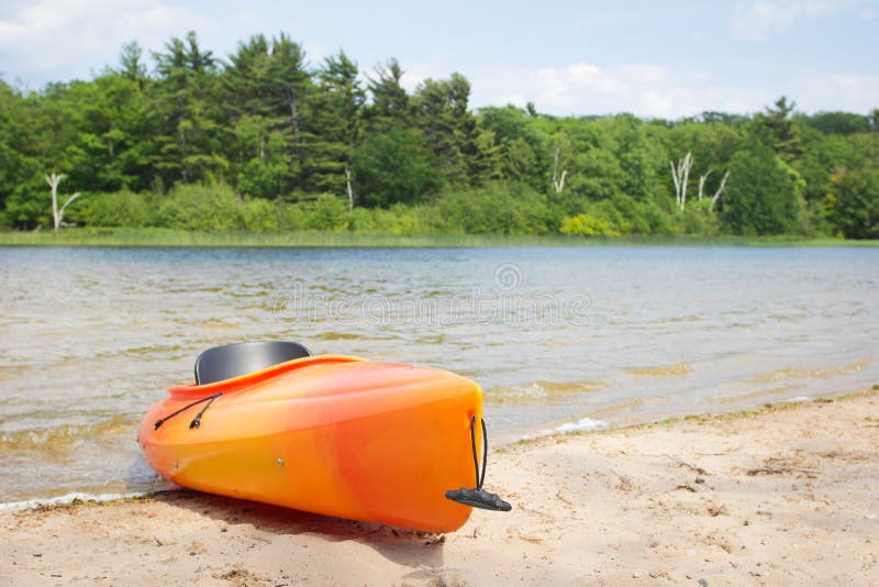 Beach Kayak Near Woods stock photo. Image of paddle, paddling - 37725936