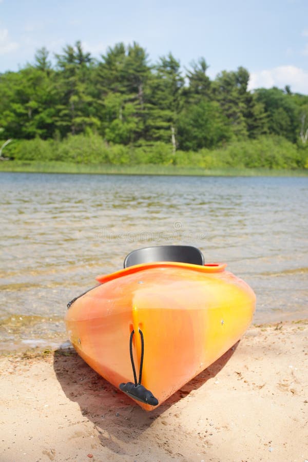 Beach Kayak Near Woods stock photo. Image of adventure - 37725920
