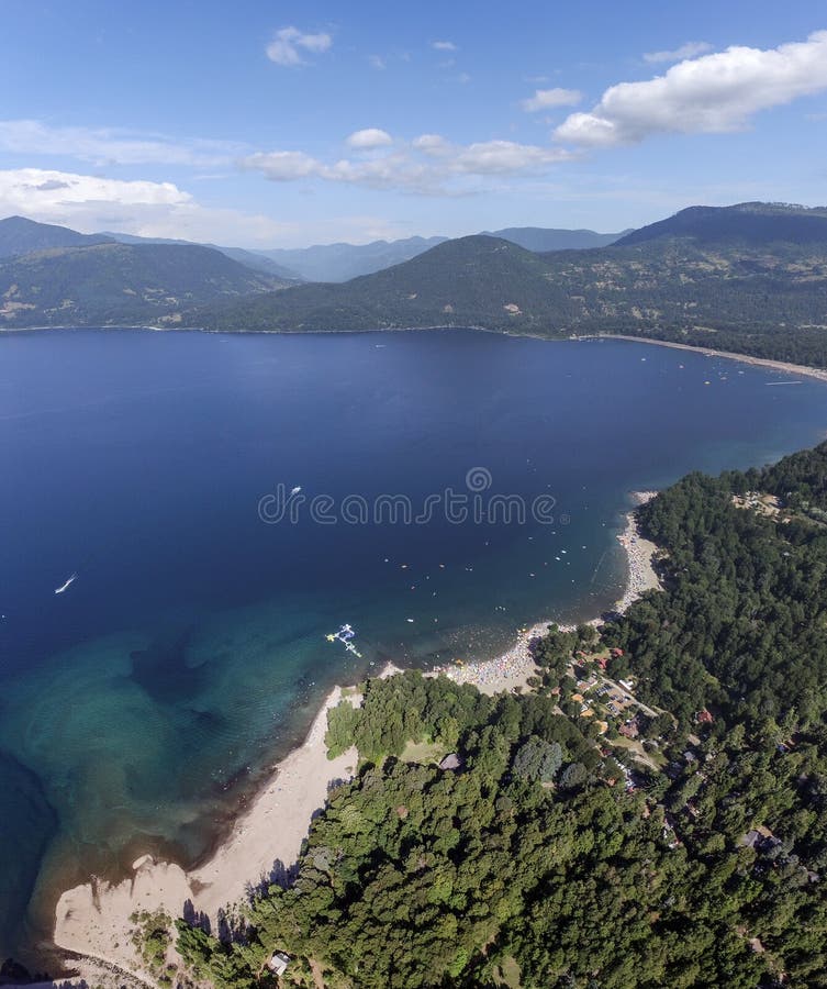 Beach in a Lake with a Forest Stock Photo - Image of clouds, landscape ...