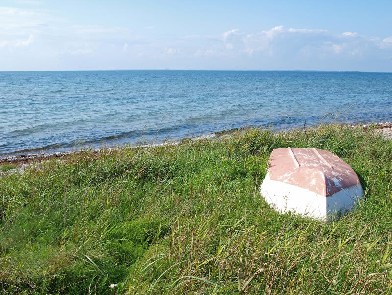 Beach Landscape -Skiff Boat on the Grass Stock Photo - Image of scene ...